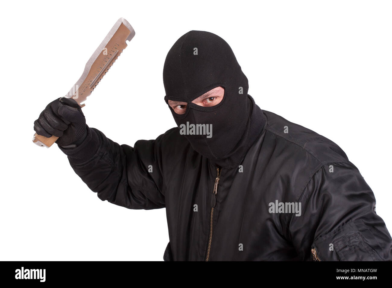 terrorist in black uniform with big knife Stock Photo - Alamy