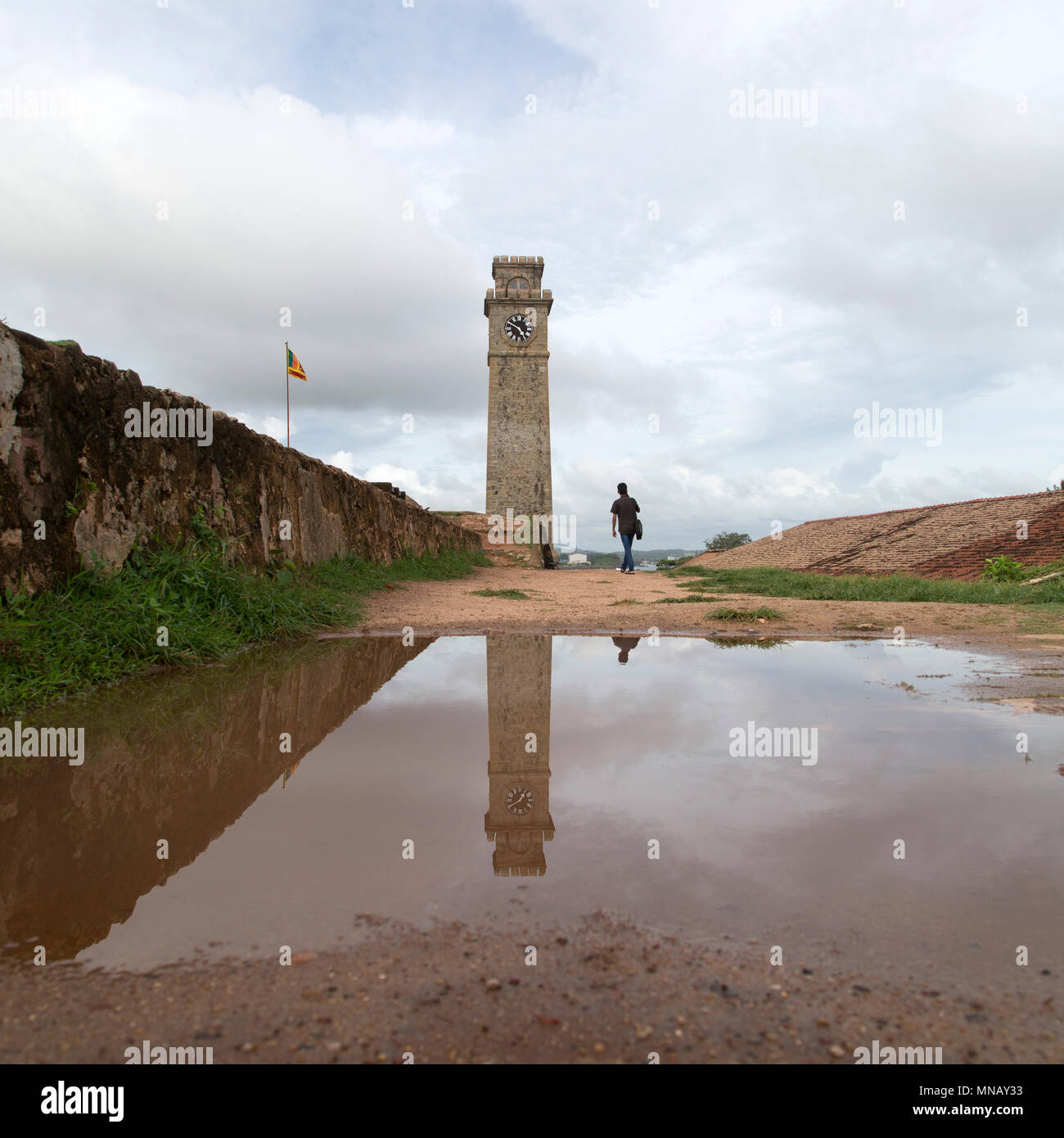 Galle Fort Clock Tower at Galle in Sri Lanka. The tower reflects in a ...