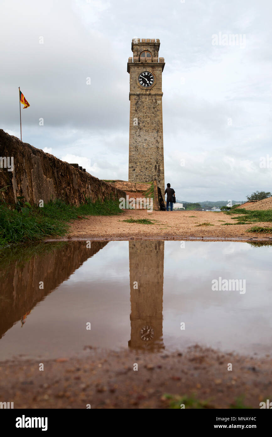 Galle Fort Clock Tower at Galle in Sri Lanka. The tower reflects in a ...