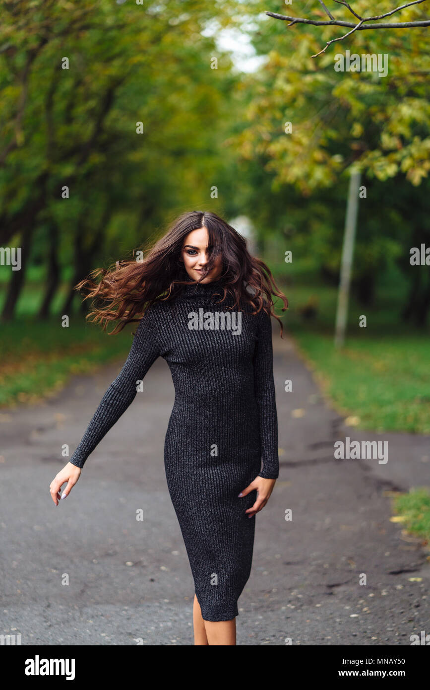 Outdoor portrait of young pretty beautiful calm woman Stock Photo - Alamy