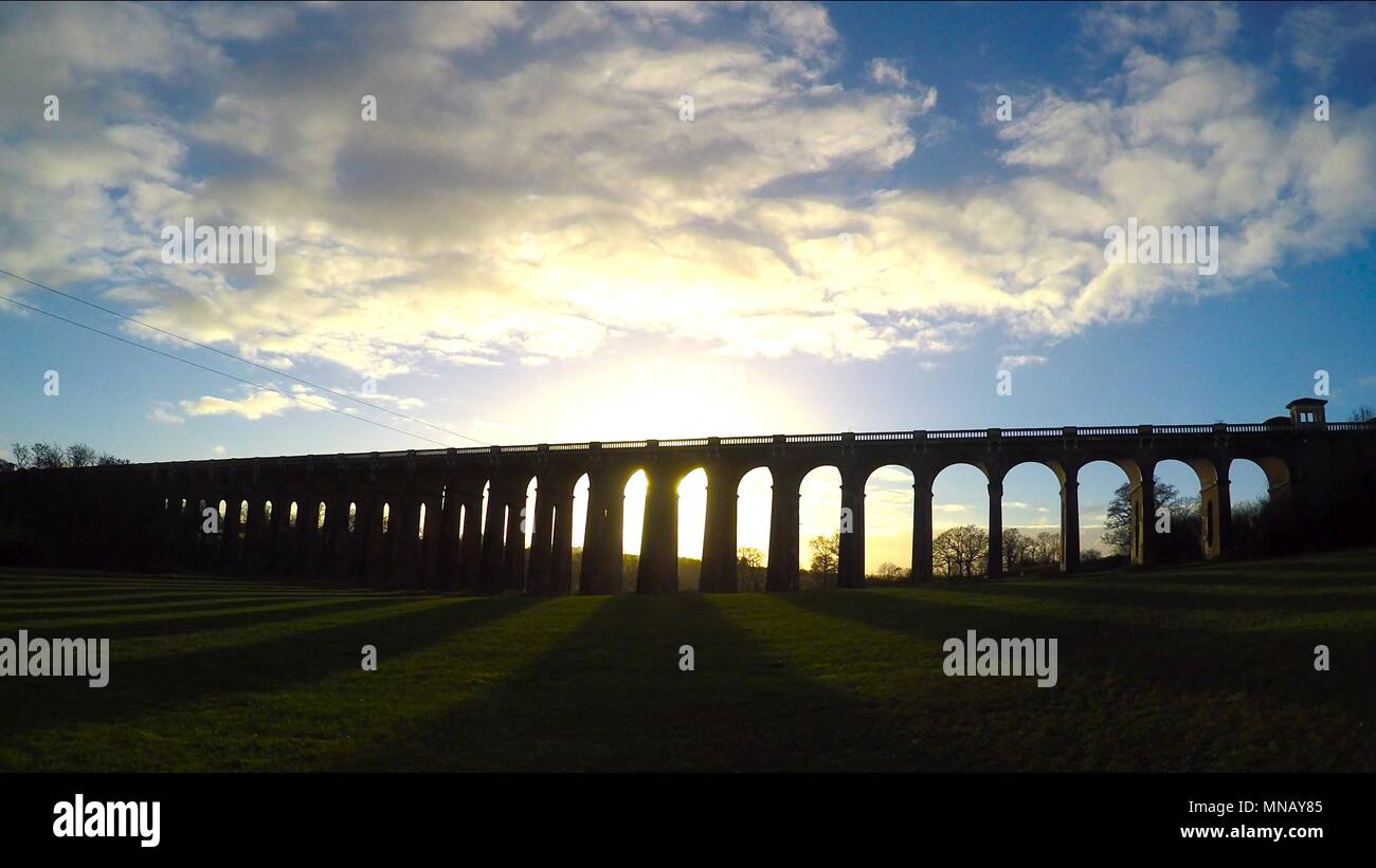 The sun casting long shadows at the Balcombe Viaduct across the River ...