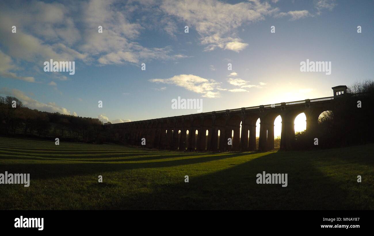 The sun casting long shadows at the Balcombe Viaduct across the River ...