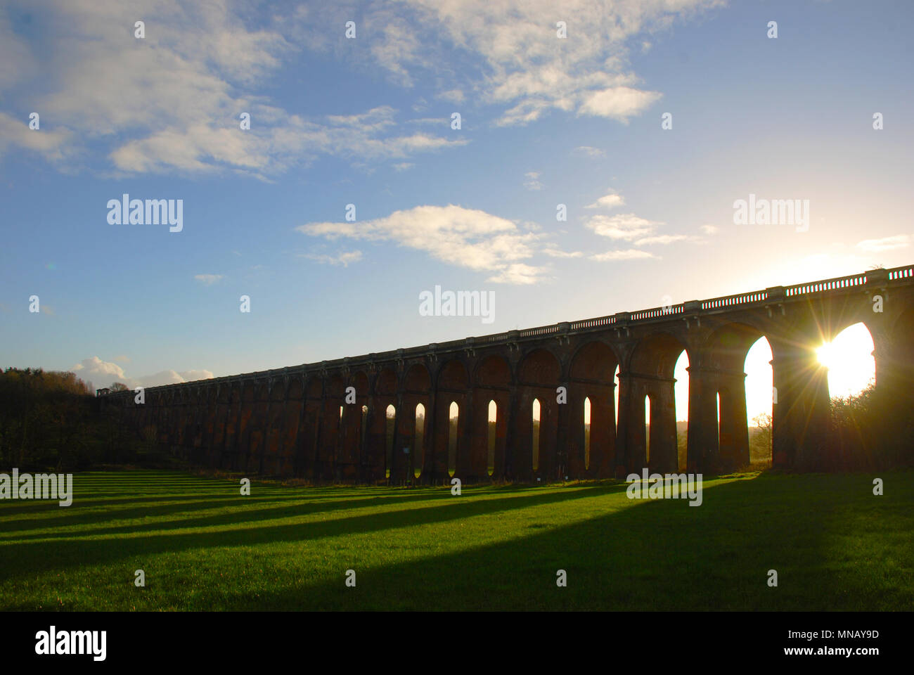 The sun casting long shadows at the Balcombe Viaduct across the River ...