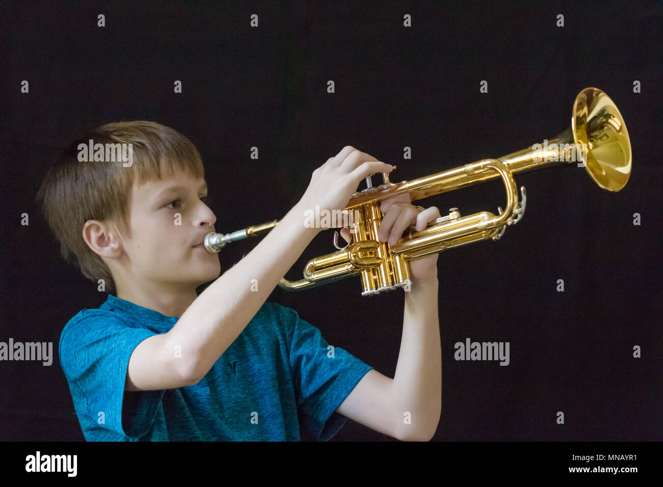 Brass instrument teenager hi-res stock photography and images - Alamy