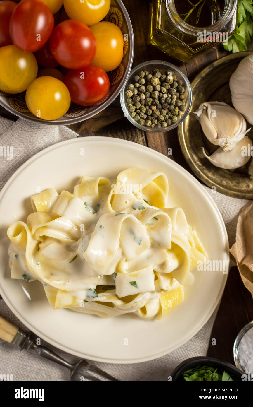 Pappardelle Pasta with Creamy Alfredo Sauce Stock Photo - Alamy