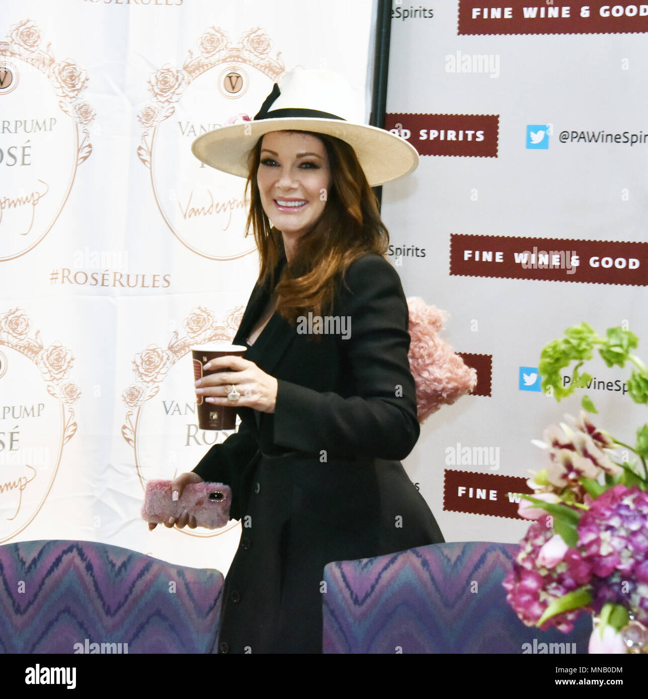 Lisa Vanderpump signs bottles of her new wine Vanderpump Rosé at the ...
