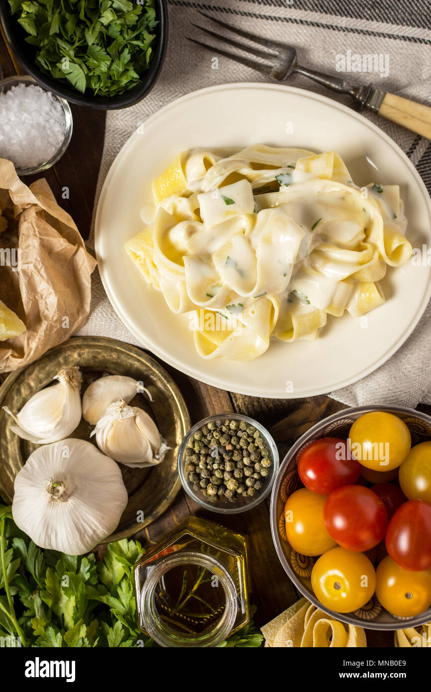 Pappardelle Pasta with Creamy Alfredo Sauce Stock Photo - Alamy