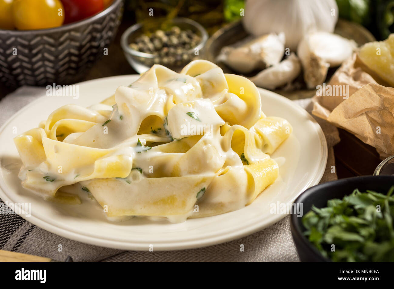 Pappardelle Pasta with Creamy Alfredo Sauce Stock Photo - Alamy
