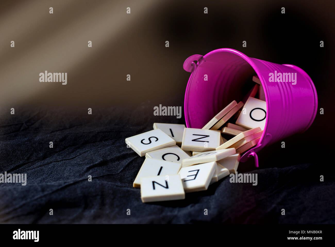 letter blocks in a bucket Stock Photo - Alamy