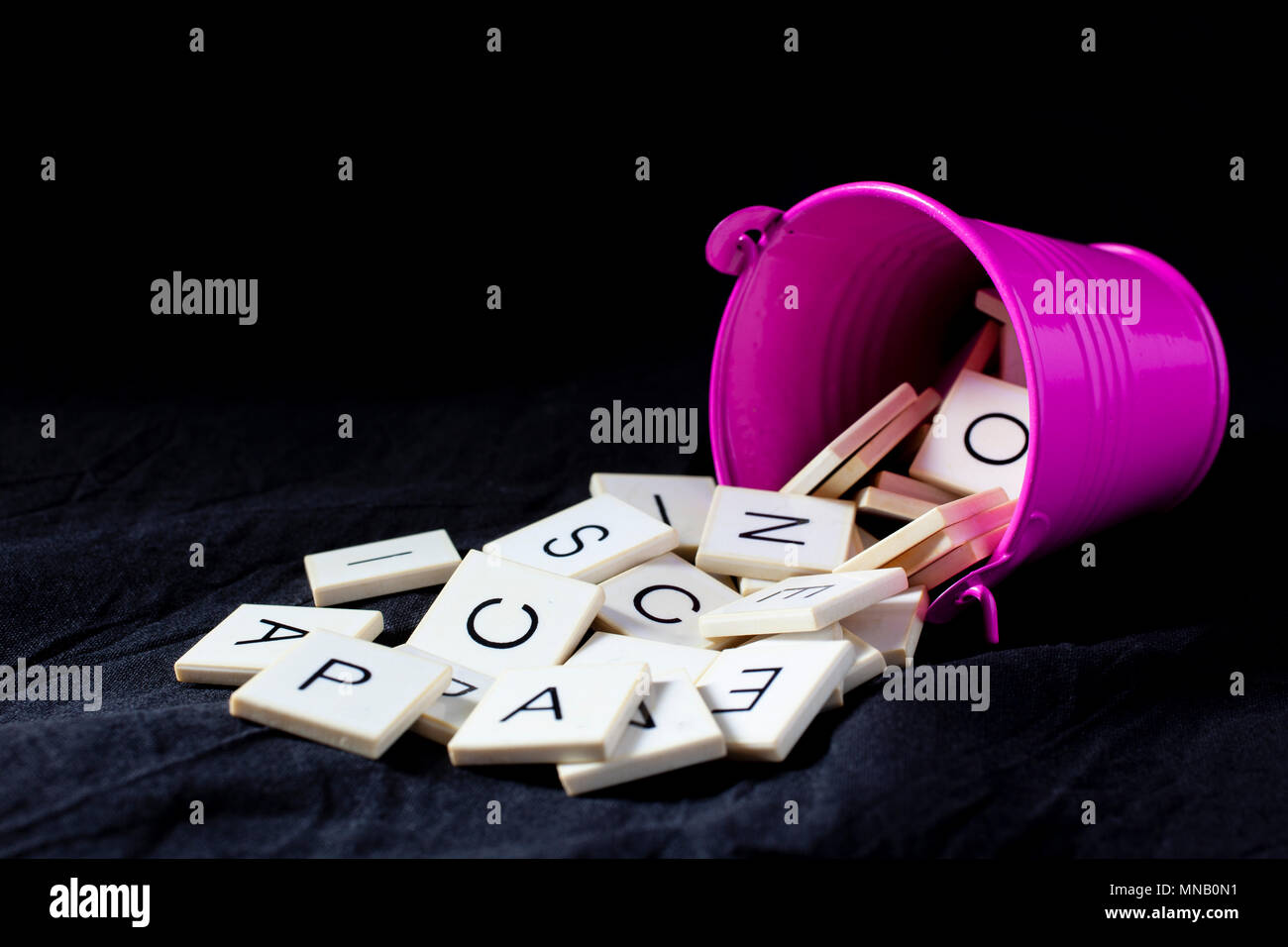 letter blocks in a bucket Stock Photo - Alamy