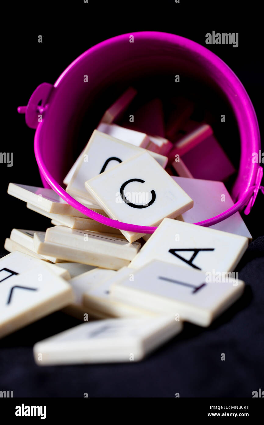 letter blocks in a bucket Stock Photo - Alamy