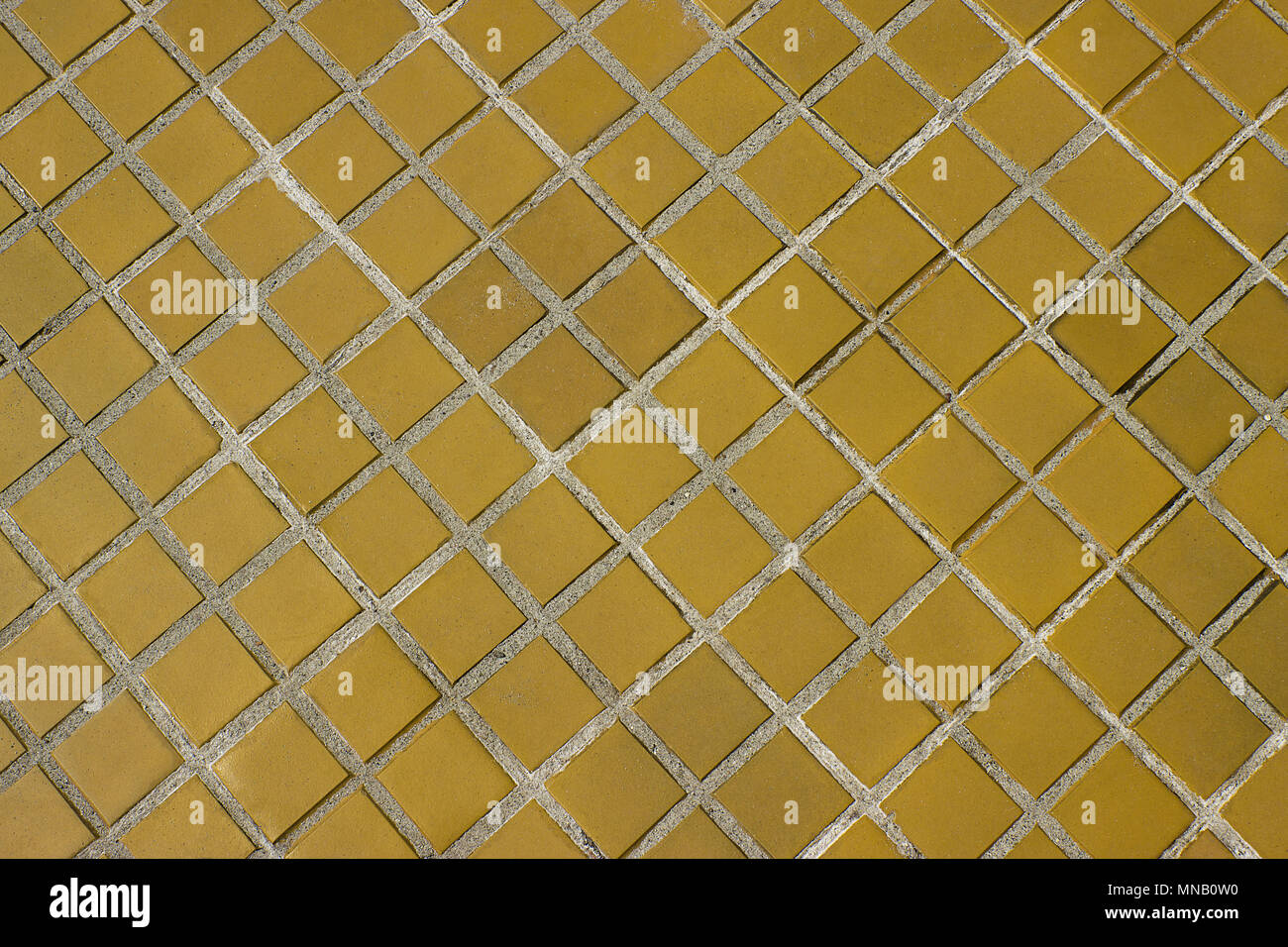Yellow square tile floor background or texture Stock Photo - Alamy