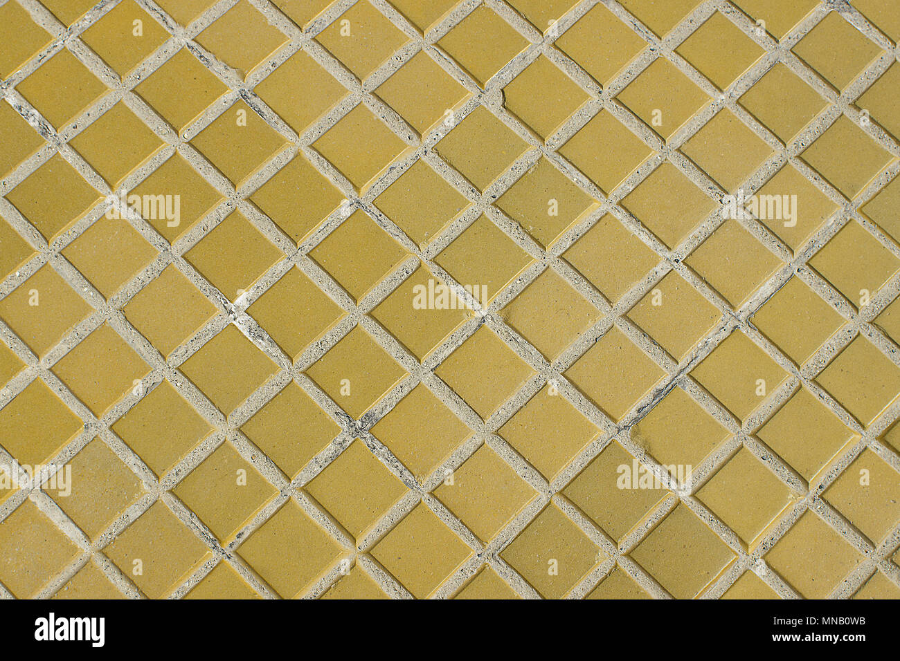 Yellow square tile floor background or texture Stock Photo - Alamy