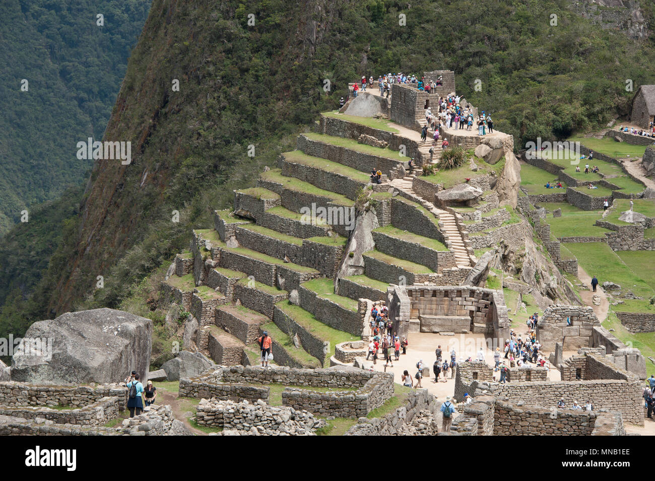 Tourist crowds explore the amazing stepped valley landscape with its ...