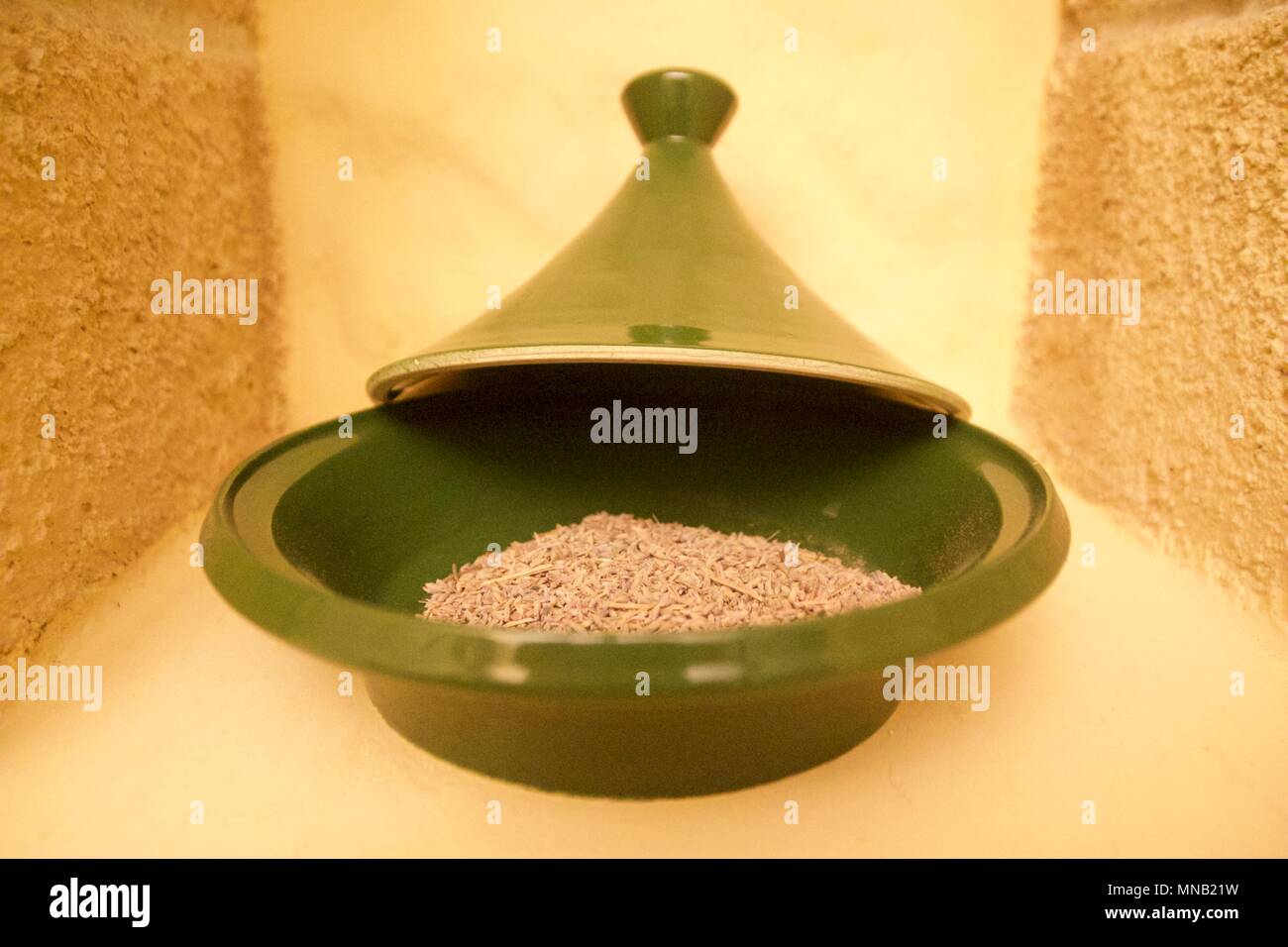 A green tagine filled with fennel seeds to make the room smell fragrant ...