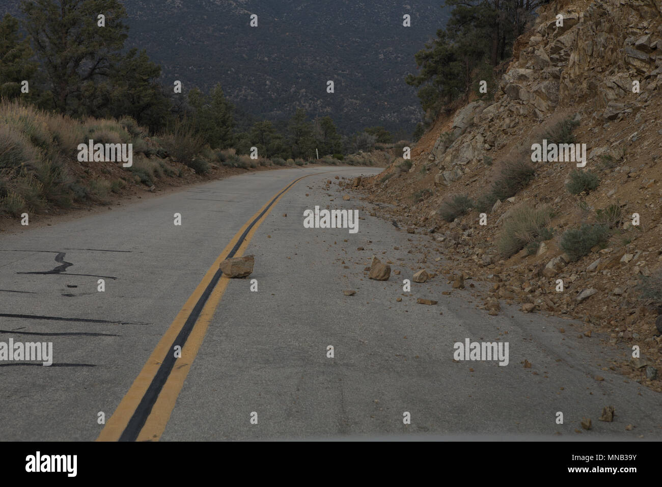 Rock slide road boulder hi-res stock photography and images - Alamy
