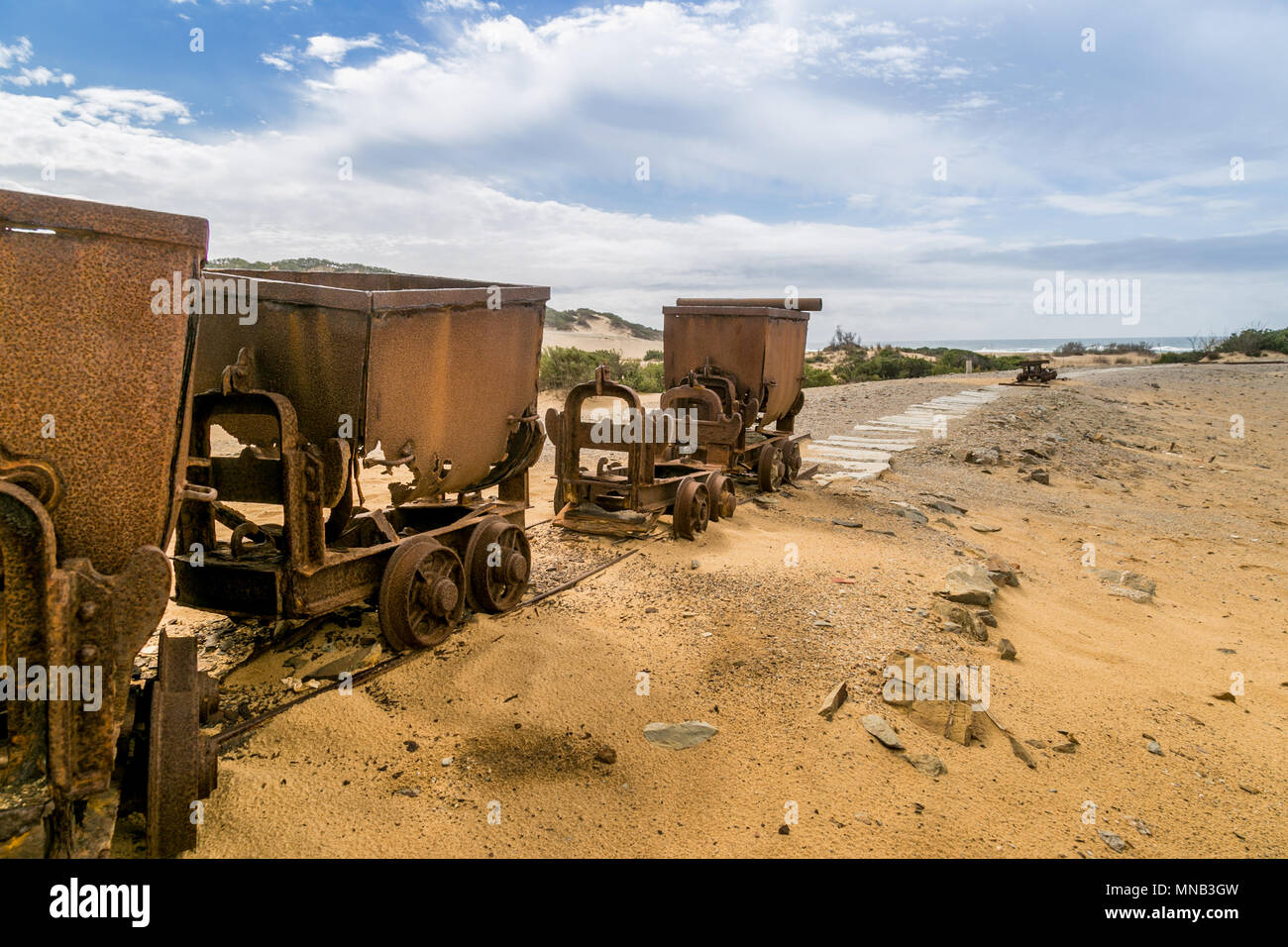 Rusty mine cart on abandoned tracks. Ingortosu Arbus, Sardinia, Italy ...