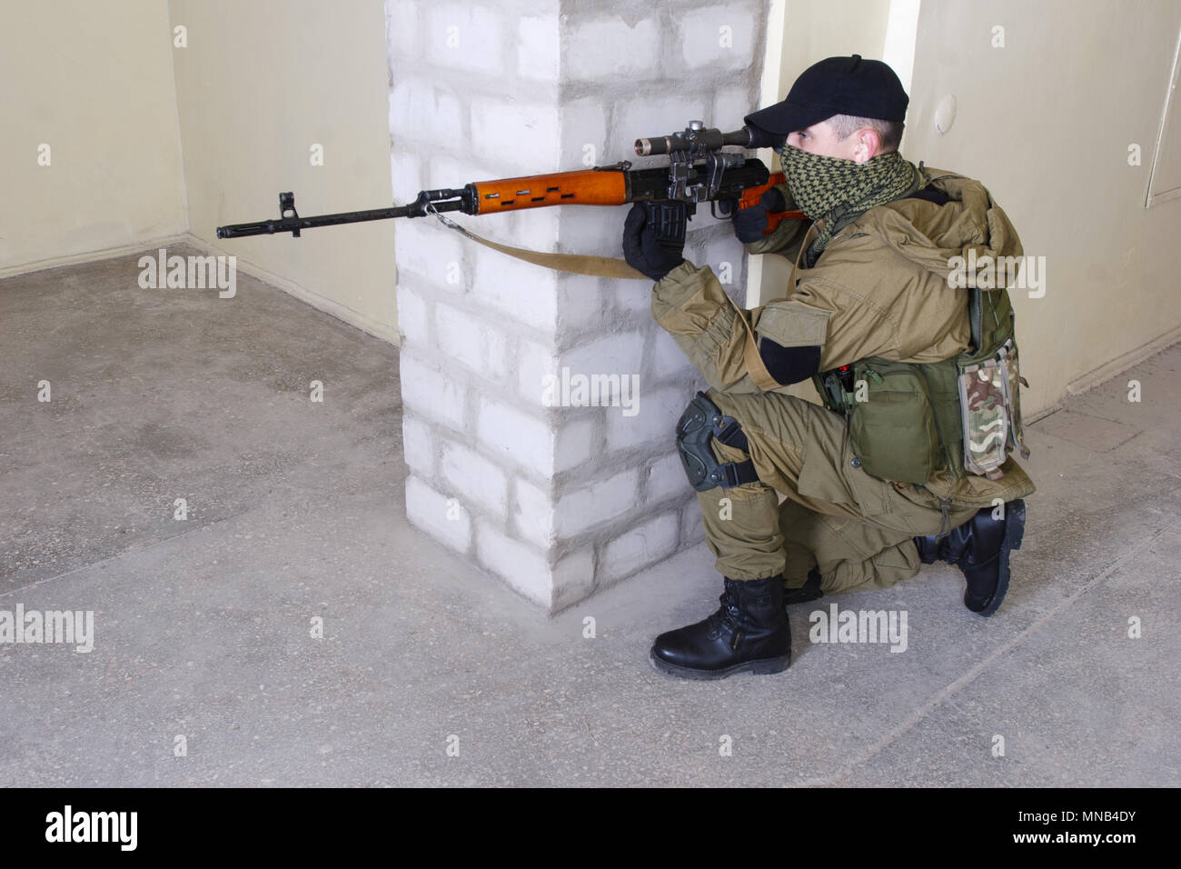 insurgent sniper with SVD rifle inside the building Stock Photo - Alamy
