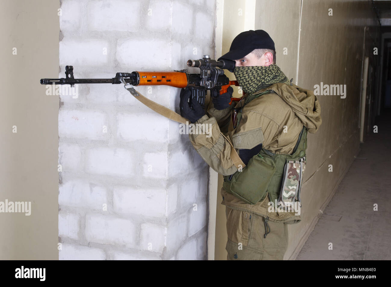 insurgent sniper with SVD rifle inside the building Stock Photo - Alamy