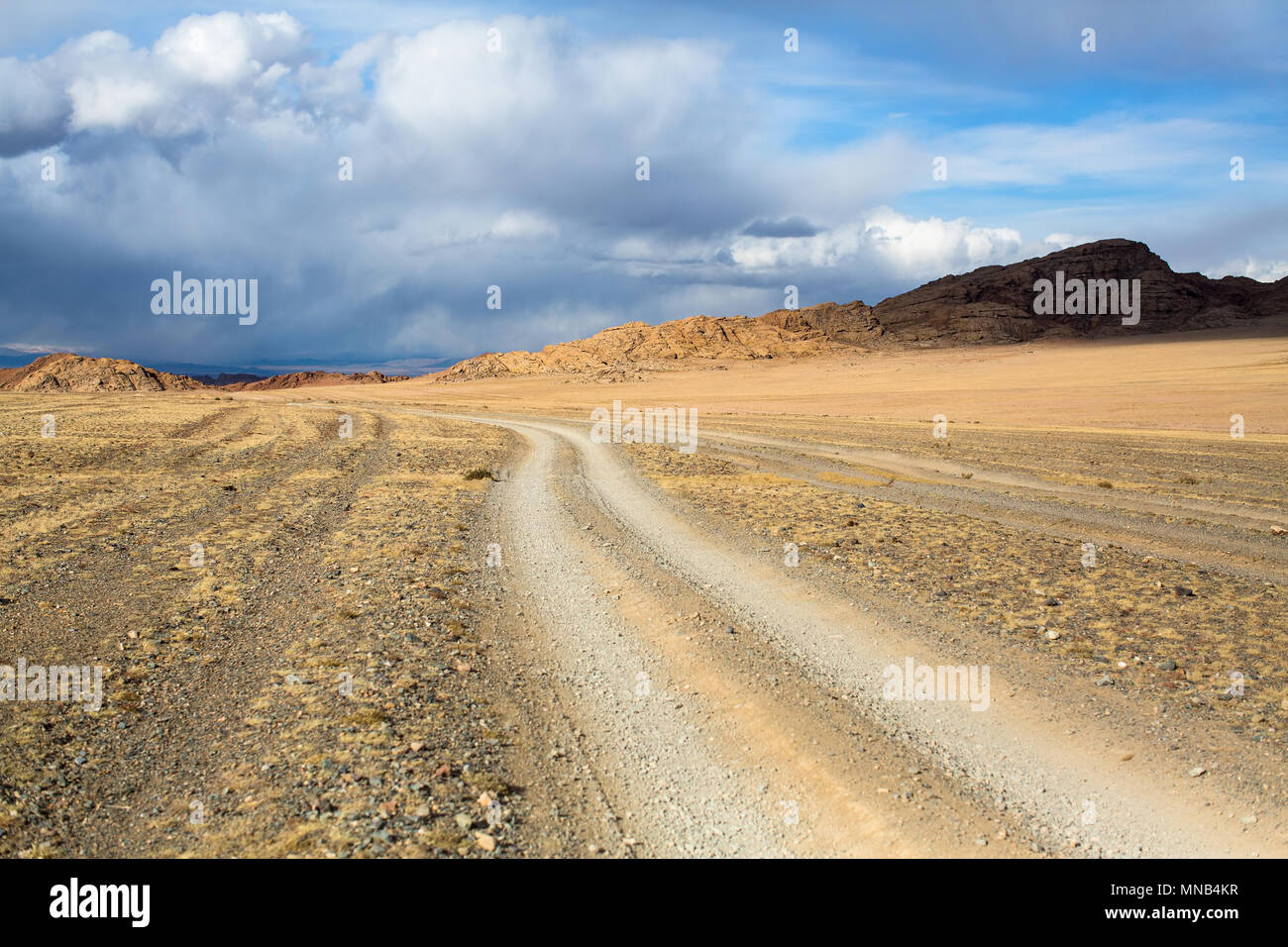 Road through the steppe and mountains of Western Mongolia Stock Photo ...