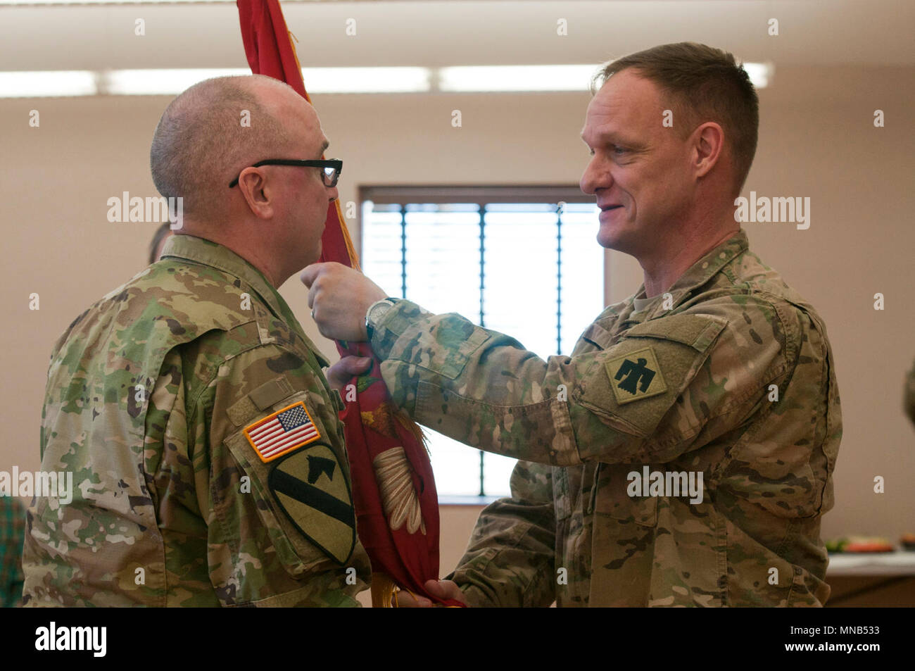 Lt. Col. Kenneth Mitchell (left), incoming commander of the 2nd ...