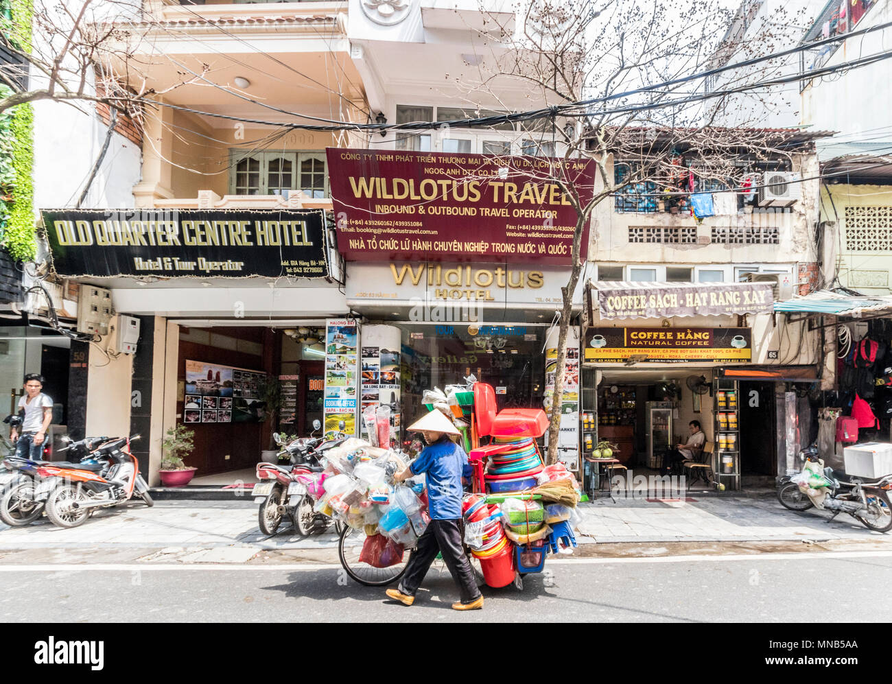Cycle vendor moving round city of Hanoi Vietnam Stock Photo - Alamy