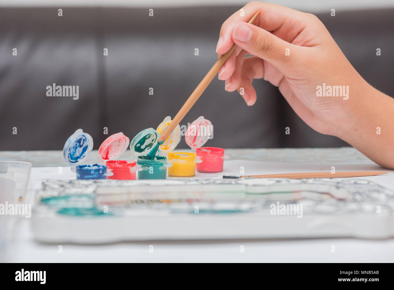 Children learn coloring and painting in classroom Stock Photo - Alamy