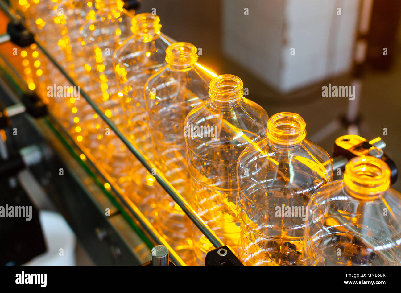 Bottle. Industrial production of plastic pet bottles. Factory line for ...
