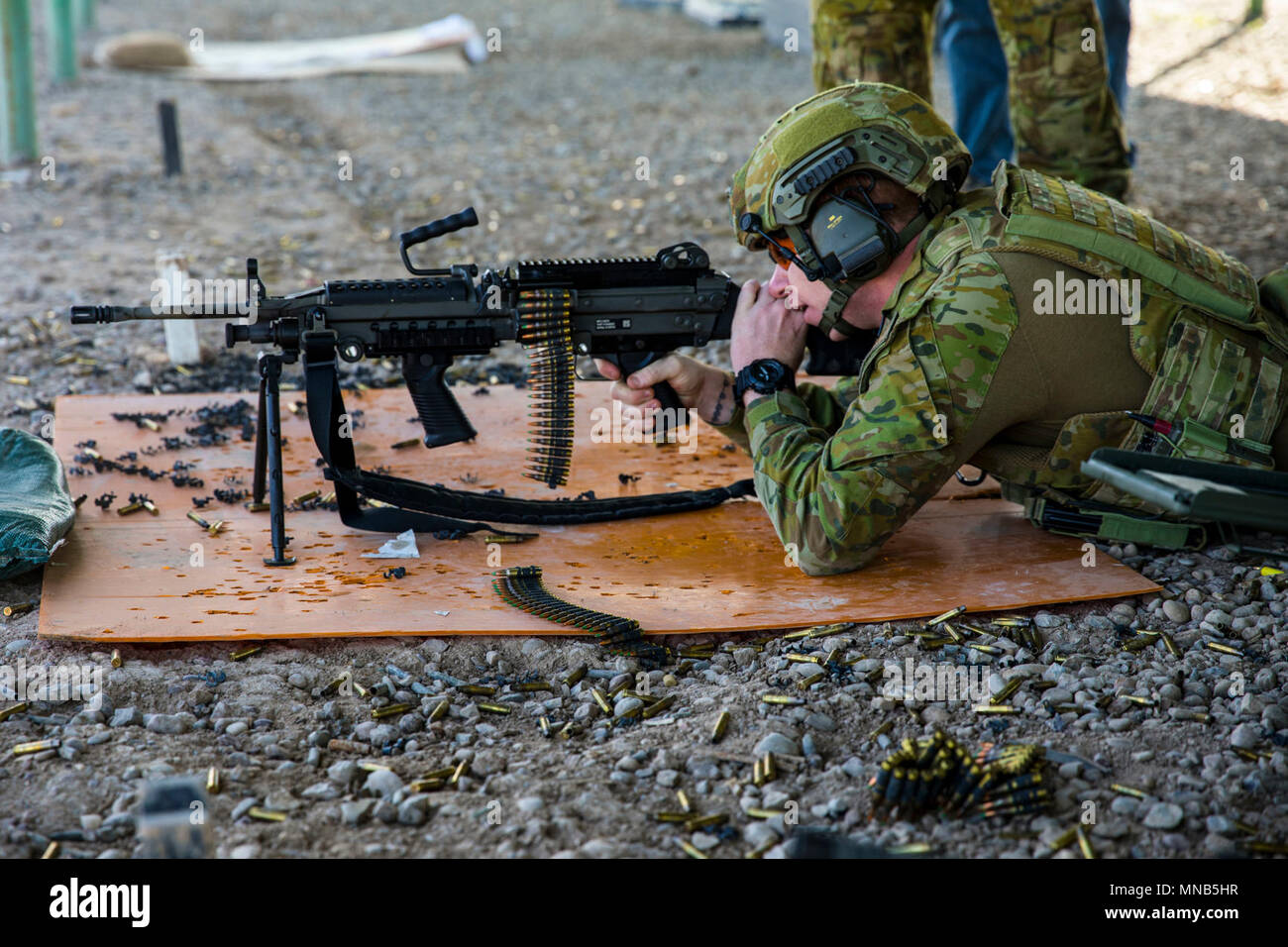 Australian army Cpl. Sean Bellert, with Task Force Taji, demonstrates a ...
