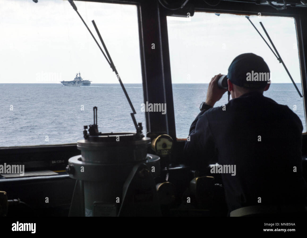 WATERS SOUTH OF JAPAN (March 12, 2018) Ensign Anders Holt, from Bedford ...