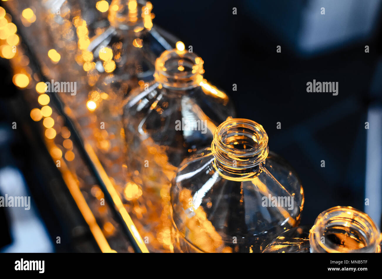 Bottle. Industrial production of plastic pet bottles. Factory line for ...