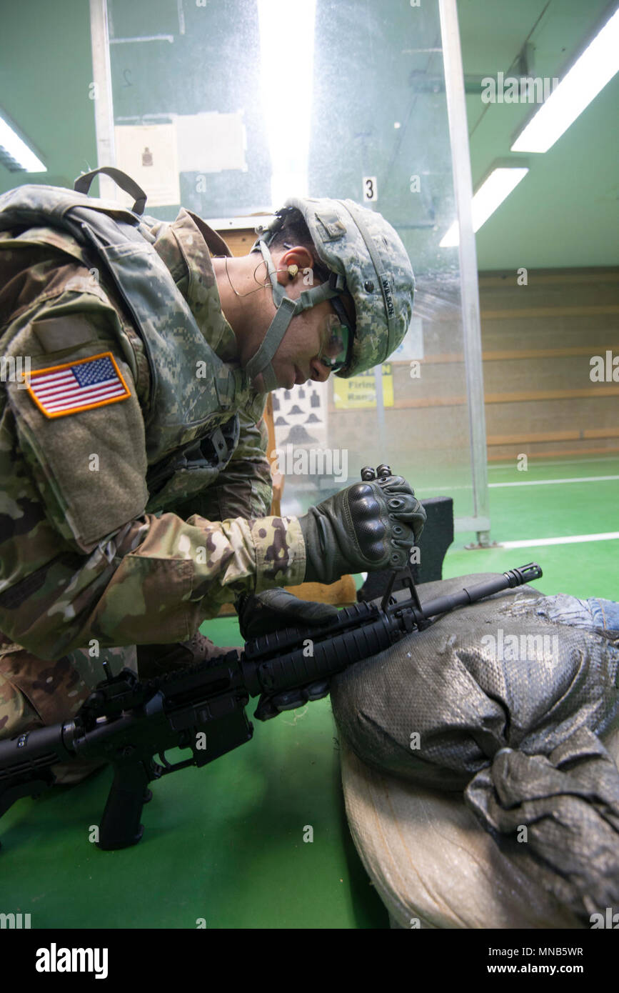 U.S. Army Sgt. Peter Wilson, assigned to the 102nd Strategic Signal ...