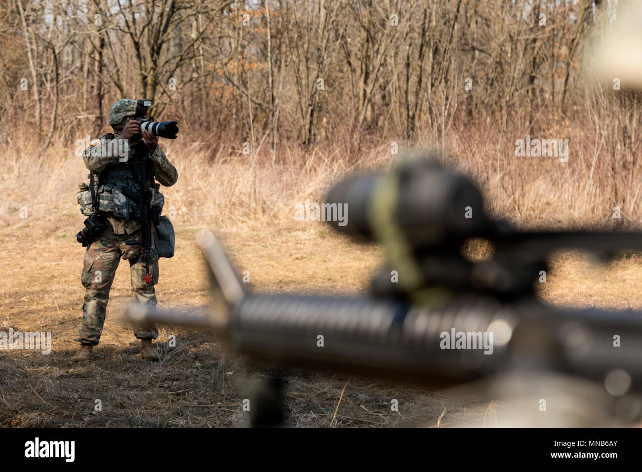 U.S. Army Reserve Spc. Torrance Saunders, a combat documentation ...