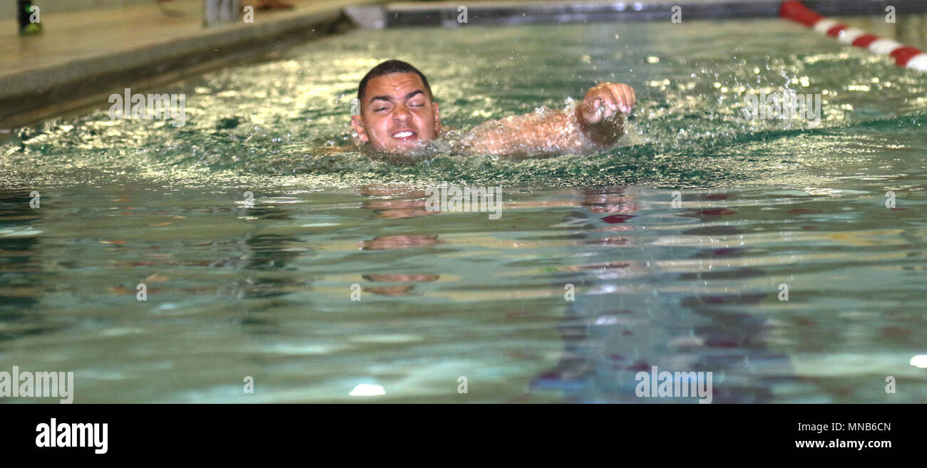 Staff Sgt. Colby Robertson, a multiple launch rocket system crewmember ...