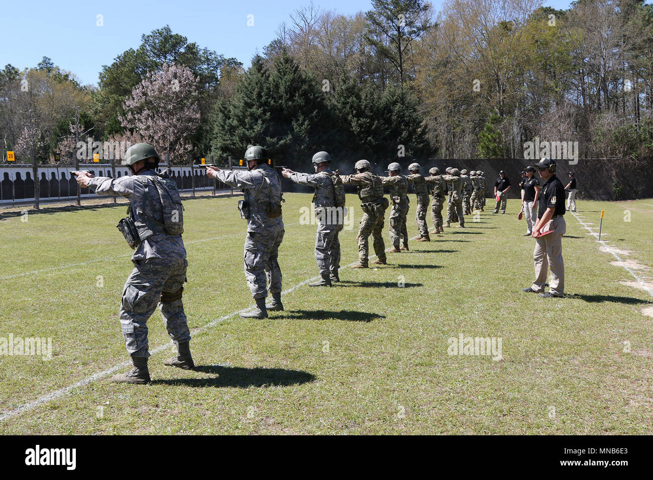 U.S. Army Soldiers from the U.S. Army Marksmanship Unit supervise the ...