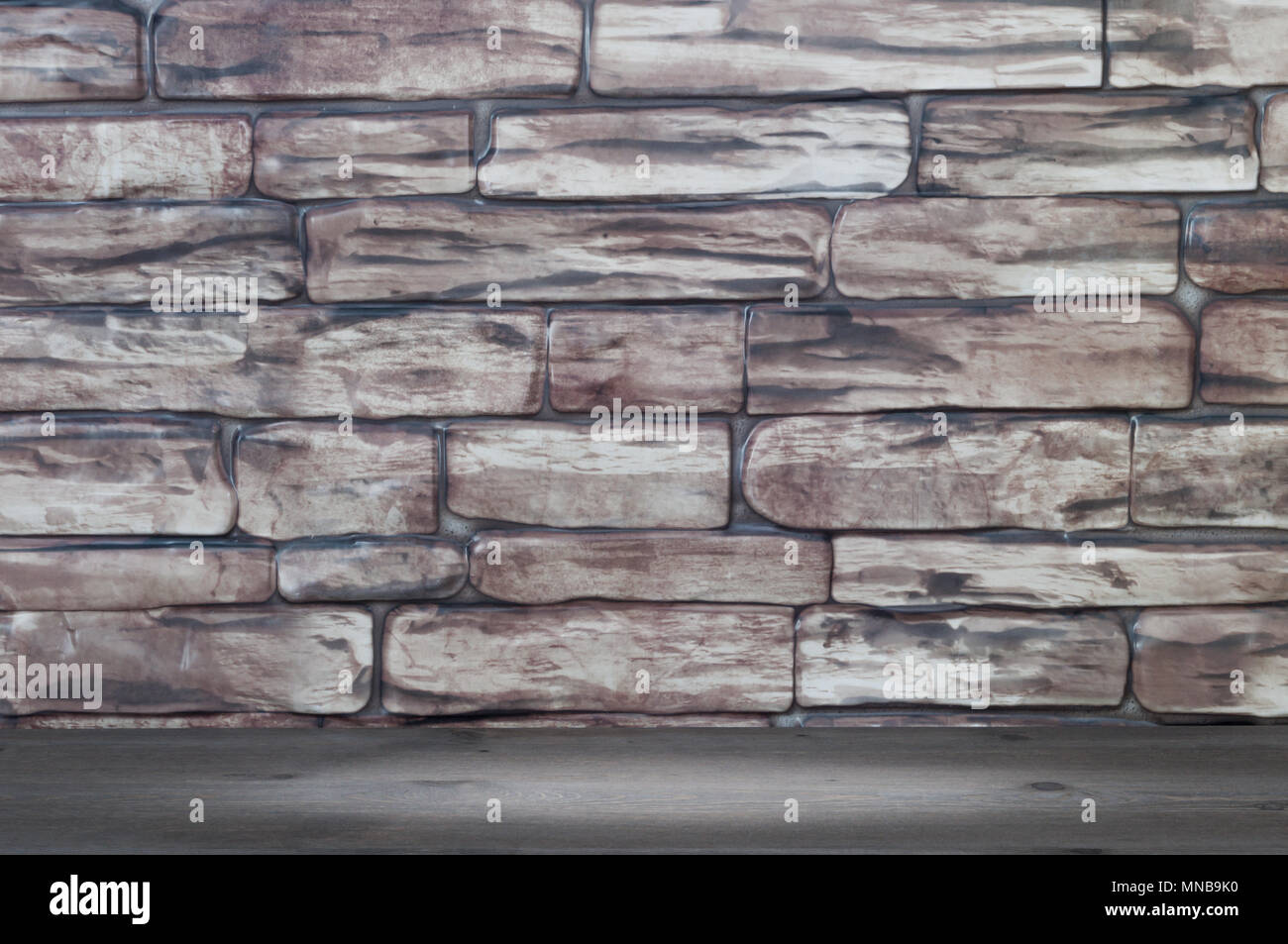 Wall of large brown bricks and wooden boards with spot lighting Stock ...