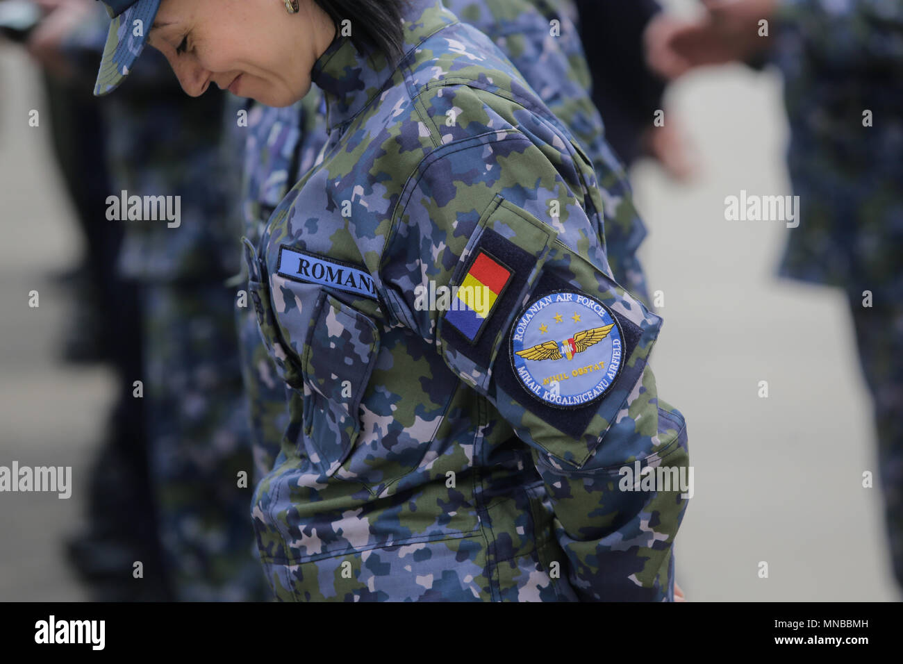 Romanian Air Force symbol on a female soldier uniform Stock Photo - Alamy
