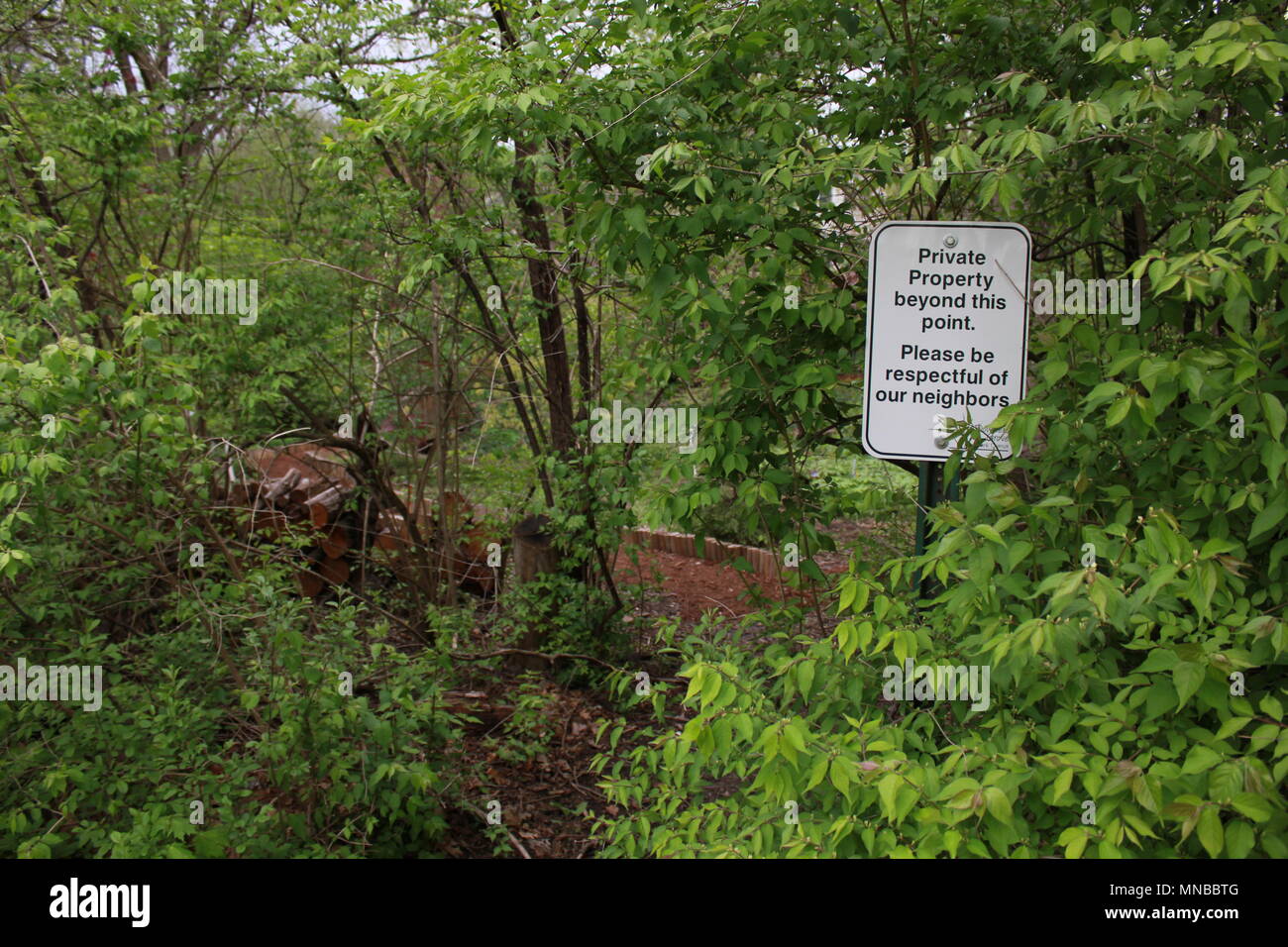 Warning sign asking people to be respectful of neighbors and ...