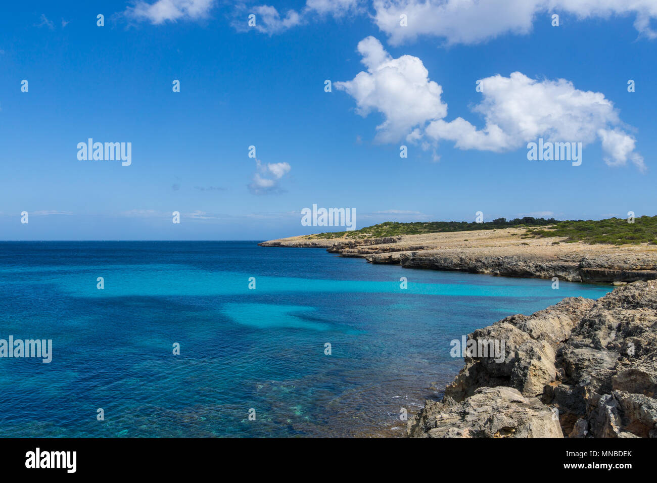 Mallorca, Blue clear water at rocky coast of holiday island Stock Photo ...