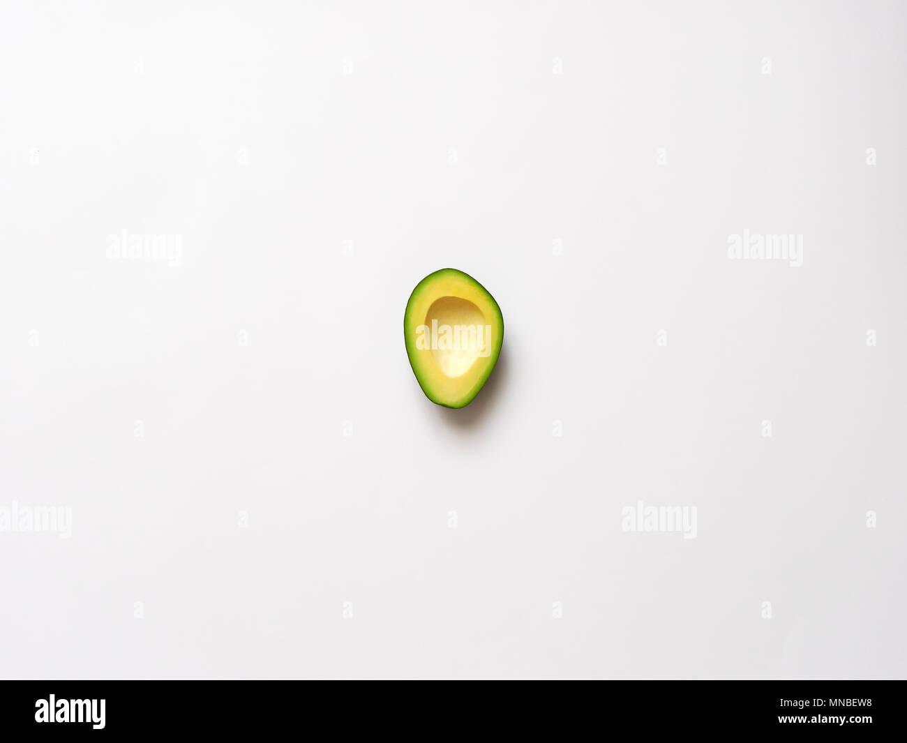 Avocado without seed isolated in white background viewed from above ...