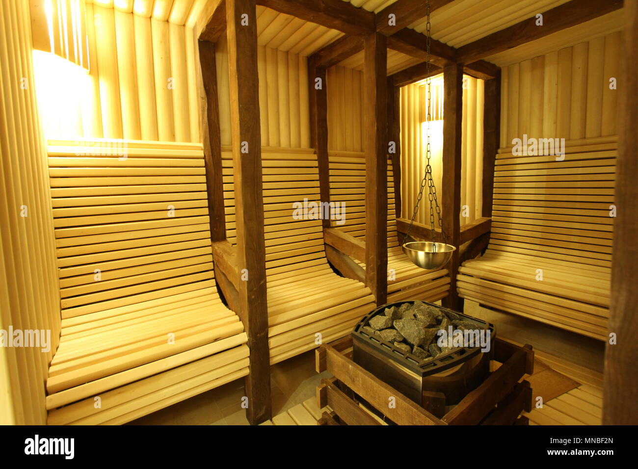 Sauna room with traditional sauna accessories Stock Photo - Alamy