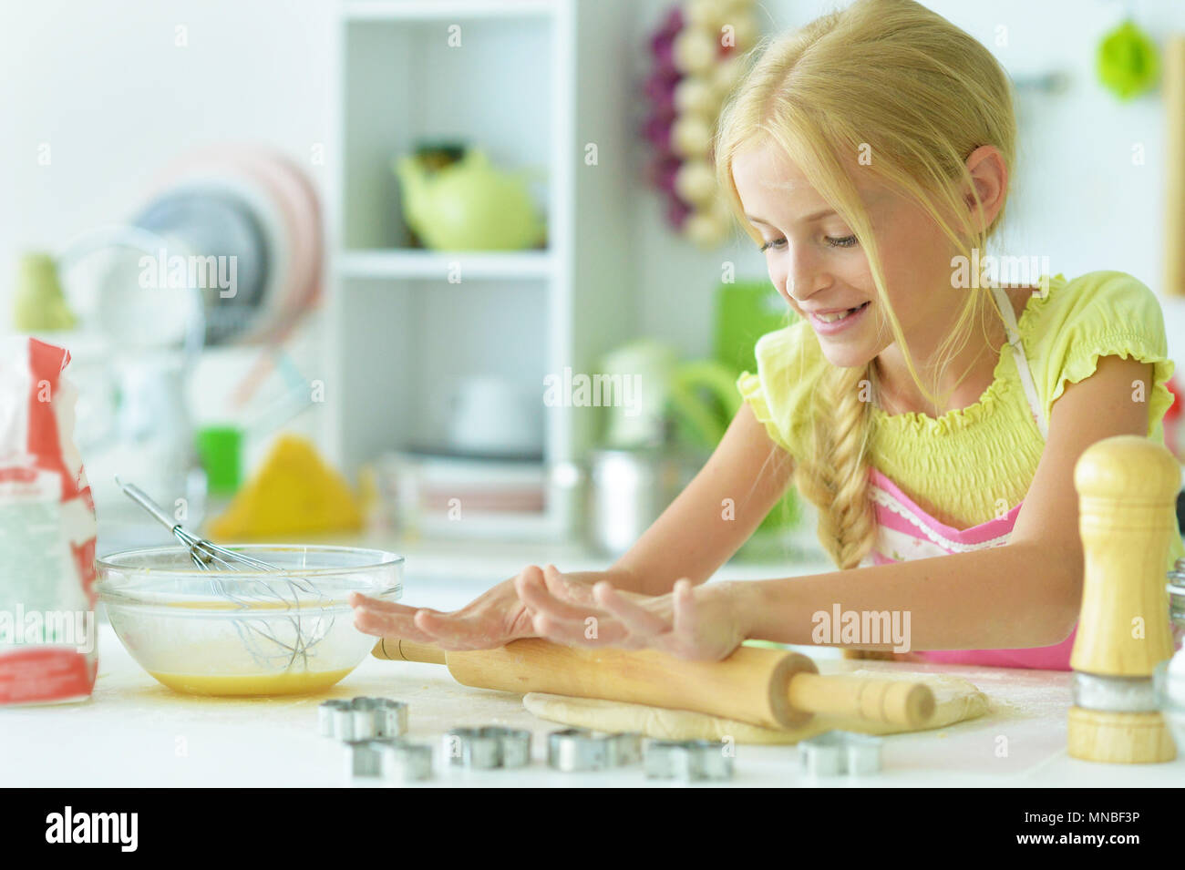 young girl in the kitchen Stock Photo - Alamy