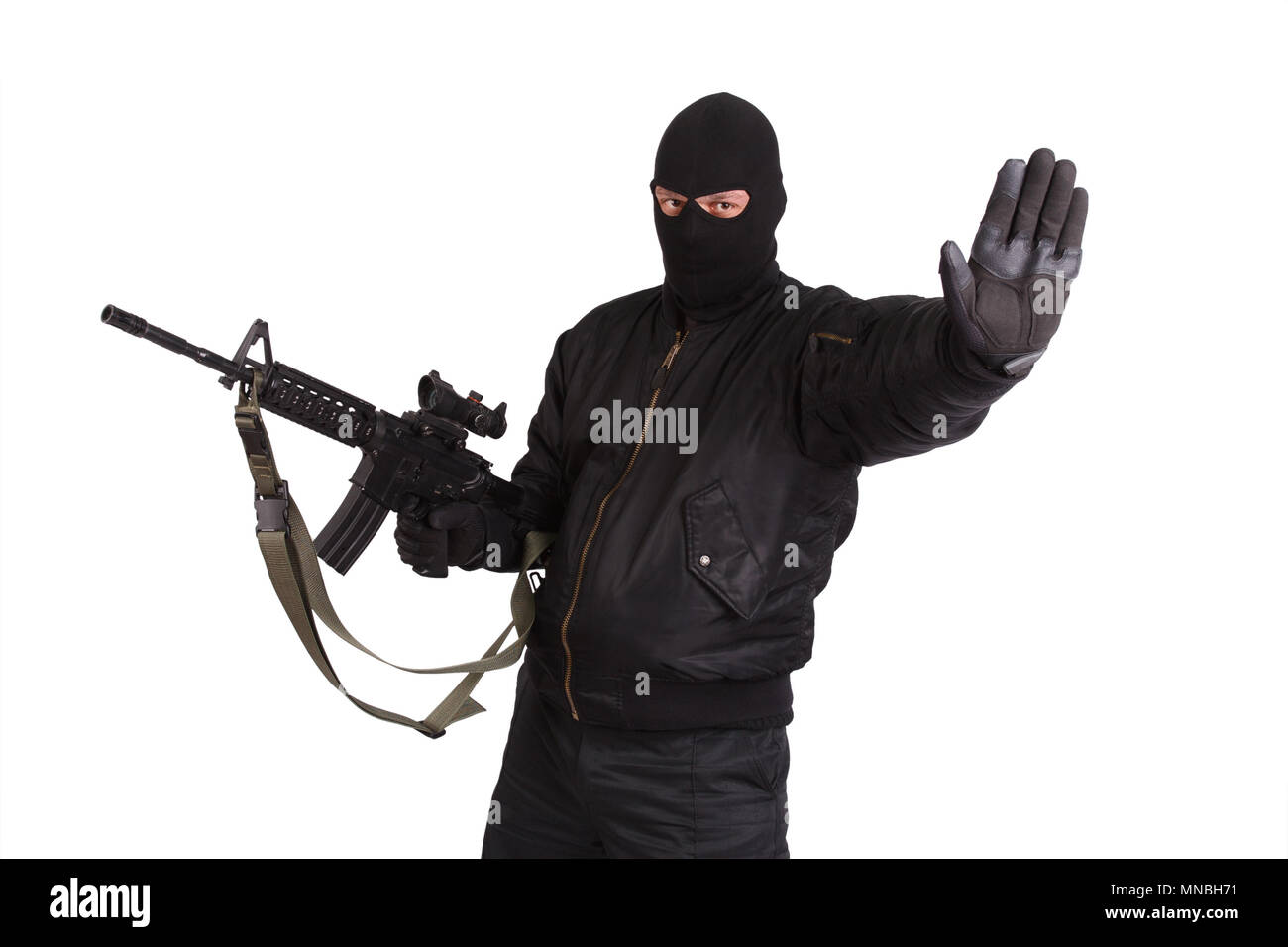 robber in black uniform and mask with m4 rifle isolated Stock Photo - Alamy