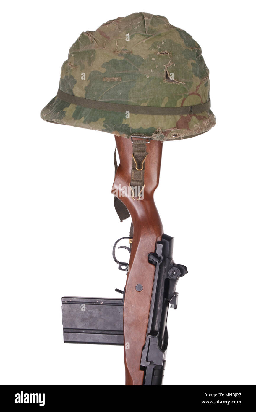 Rifle and Helmet Memorial isolated on white background Stock Photo - Alamy