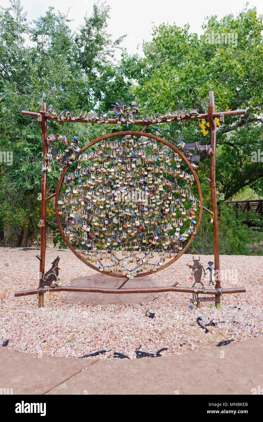 Love locks attached to a metallic structure at the entrance of Zion ...