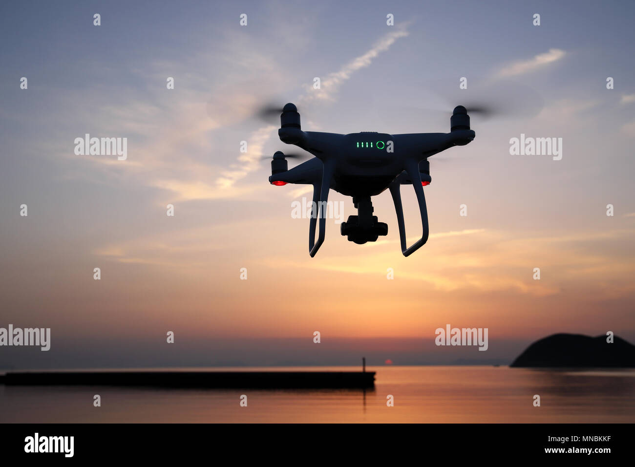 Remote controlled drone equipped with aerial photo and video hovering ...