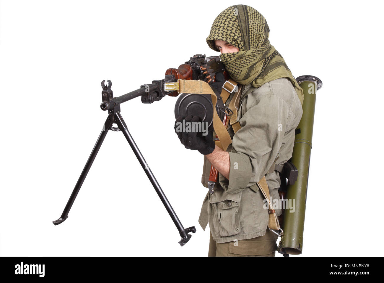 mercenary with machine gun Stock Photo - Alamy