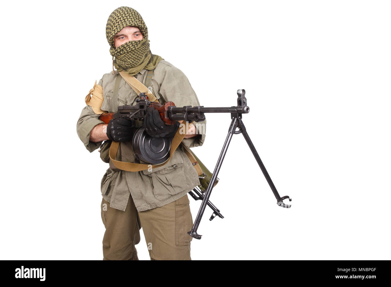 rebel with machine gun Stock Photo - Alamy