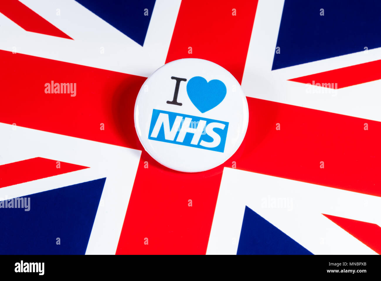 LONDON, UK - APRIL 27TH 2018: An I Love the NHS badge over the UK flag ...