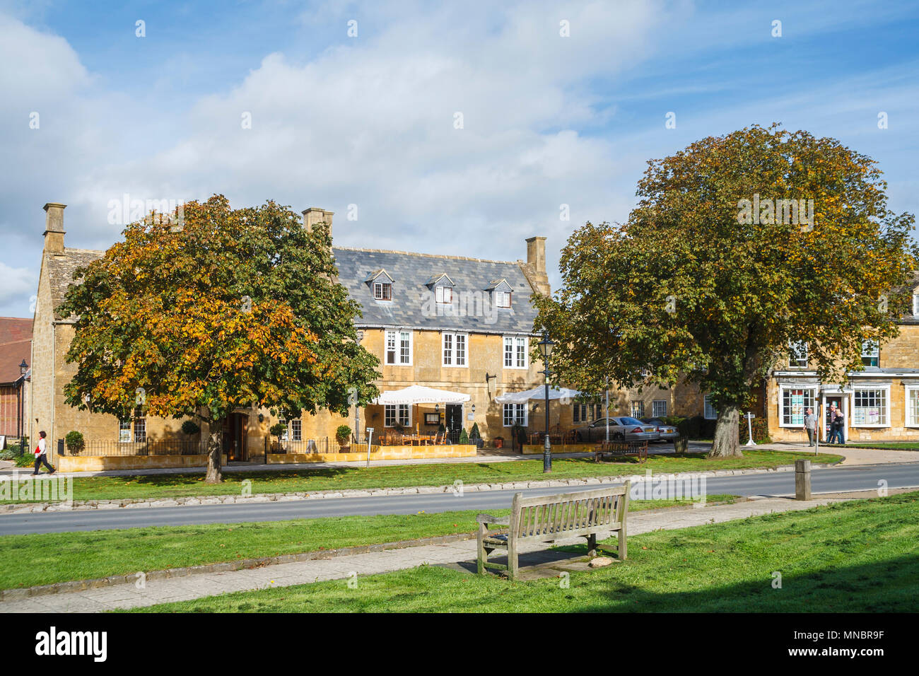 Traditional Cotswold stone local style buildings in High Street ...
